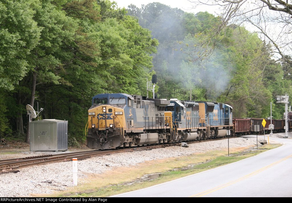 CSX 42 leads 8044, and smoking SD70MAC 4792